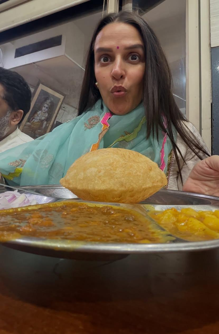 Neha Dhupia dives into authentic chole bhature, seeks blessings at ...