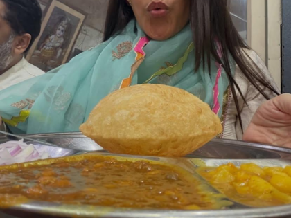 Neha Dhupia dives into authentic chole bhature, seeks blessings at ...