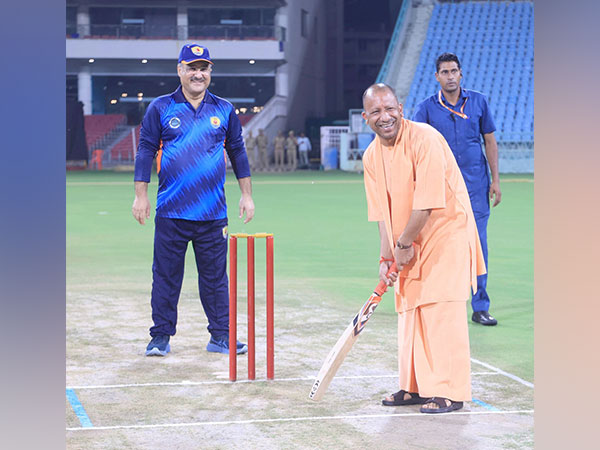 CM Yogi all smiles after trying his hand with bat during All India ...