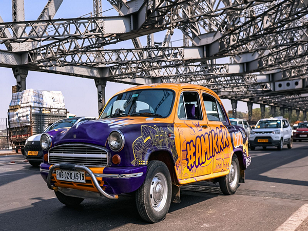 KKR's IPL 2024 trophy tours Kolkata in iconic yellow ambassador taxi ...
